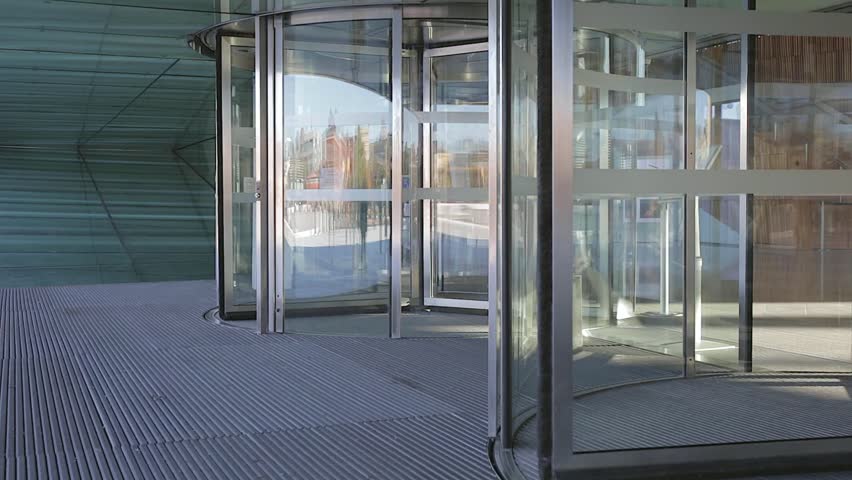automatic rotation revolving glass door Stock Footage Video (100% ...