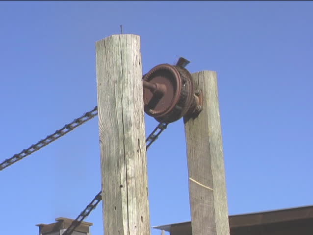 chain driven pulley suspended on posts Stock Footage Video (100% ...