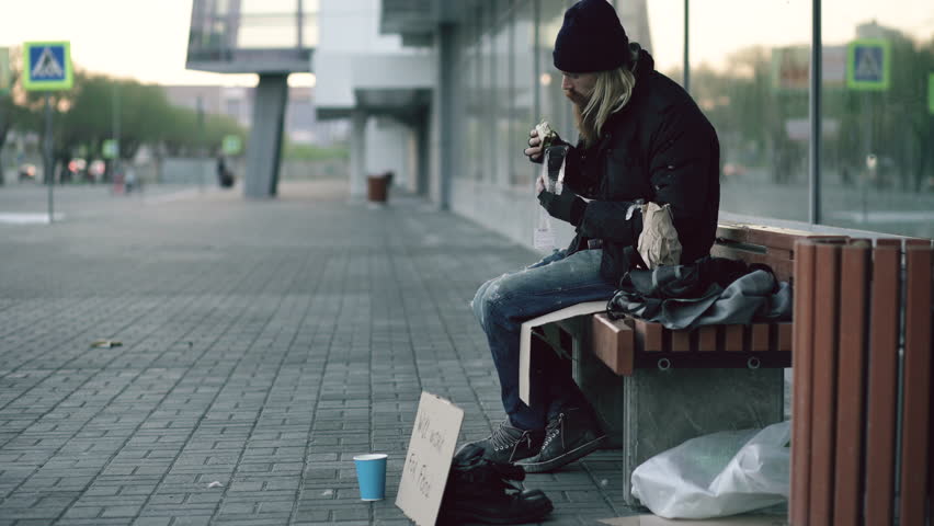 Homeless Young Man Eating Sandwich Stock Footage Video (100% Royalty ...