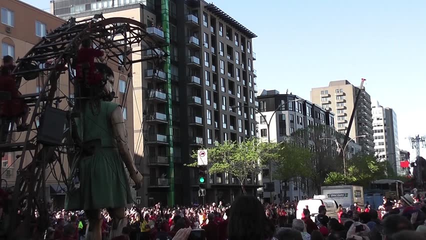 Girl giant puppet walking Stock Video Footage - 4K and HD Video Clips ...