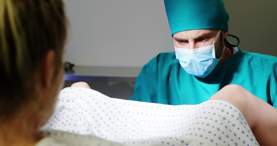Doctor Examining Pregnant Woman During Stock Footage Video (100% ...
