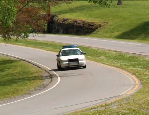 police car turns around corner rural: วิดีโอสต็อก (ปลอดค่าลิขสิทธิ์ 100 ...