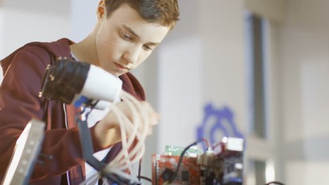 Boy Works On Fully Functional Programable Stock Footage Video (100% ...