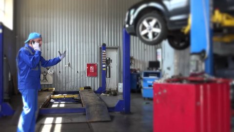 Angry Mechanic Talking Customer Near Lifted Stock Footage Video (100% ...
