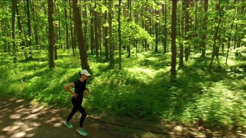 running man forest runner fit athlete Stock Footage Video (100% Royalty ...