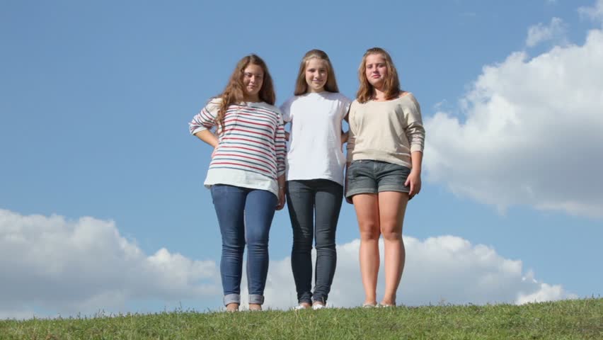 three young girls stand wave hands Stock Footage Video (100% Royalty ...
