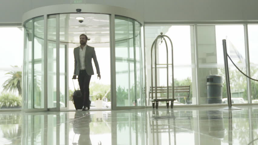 Businessman Walking in Hotel Lobby Stock Footage Video (100% Royalty ...