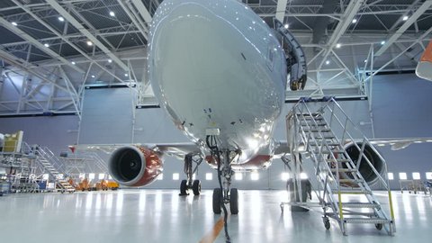 Aircraft Under Maintenance Checking Mechanical Systems Stock Photo ...
