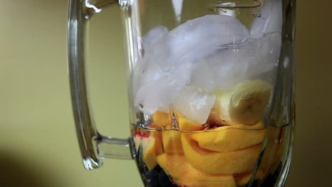 Making Delicious Blueberry Peach Banana Smoothie Stock Footage Video ...
