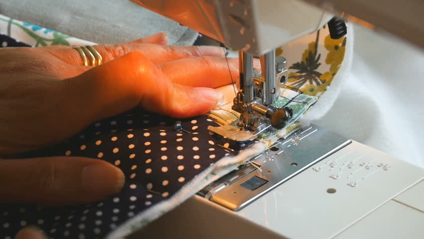 expert female hands using sewing machine Stock Footage Video (100% ...