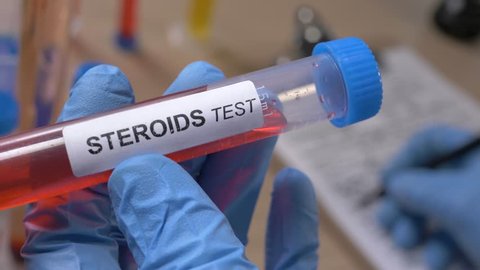 Scientist Holding Steroids Test Tube While Stock Footage Video (100% ...