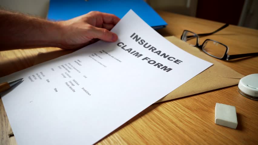 Insurance Claim Folder Stock Video Footage - 4K and HD Video Clips ...