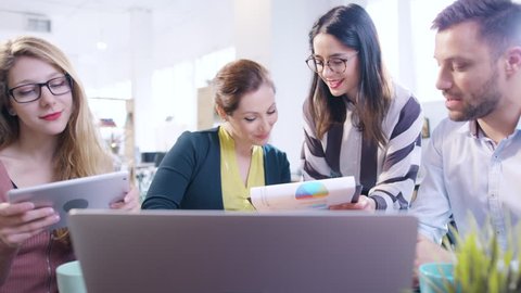 Creative College Students Discussing Project Looking Stock Footage ...