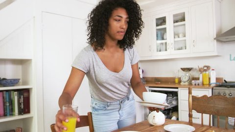 Teenage Girl Clearing Breakfast Table Loading Stock Footage Video (100% ...