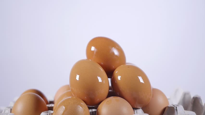 wet eggs stacked pyramid cardboard tray Stock Footage Video (100% ...