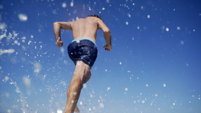 shot water young men running jumping Stock Footage Video (100% Royalty ...