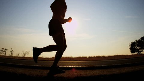 Athletic Young Man Running On Road Stock Footage Video (100% Royalty ...