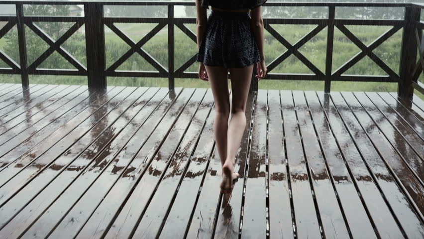 Girl Walking On the Wet Stock Footage Video (100% Royalty-free ...