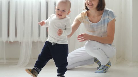 Young Child Taking First Steps Stock Footage Video (100% Royalty-free ...