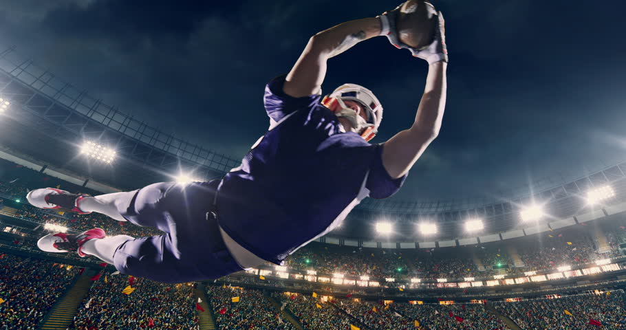 American Football Player Jumps with Stock Footage Video (100% Royalty ...