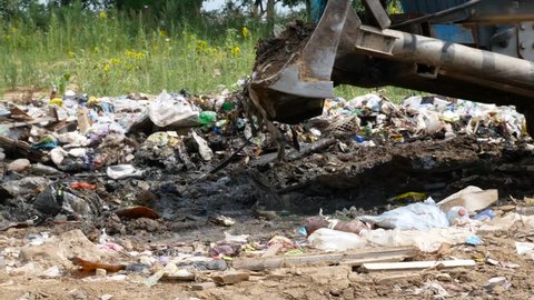 Bulldozer Shovel Pushing Garbage Landfill Stock Footage Video (100% ...