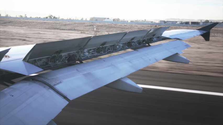 plane taking off runway detail wing Stock Footage Video (100% Royalty ...