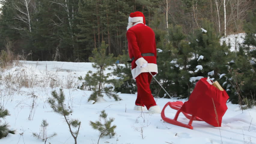 Santa Pulling Sled with Sack Stock Footage Video (100% Royalty-free ...