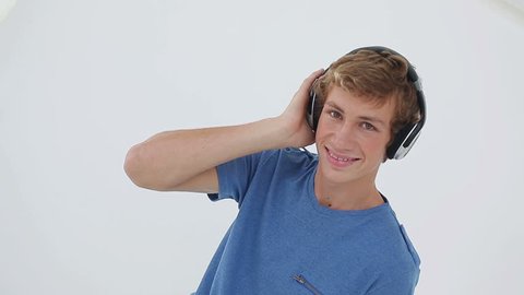 Happy Young Man Listening Music Against Stock Footage Video (100% ...