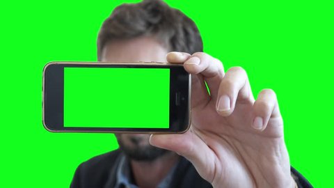 Man Behind Green Screen Smartphone Close Stock Footage Video (100% ...