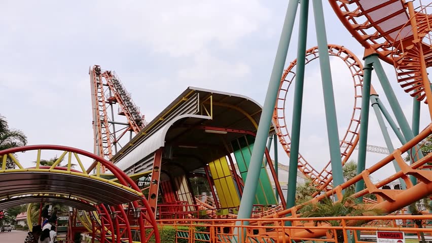 people playing roller coaster amusement park Stock Footage Video (100% ...