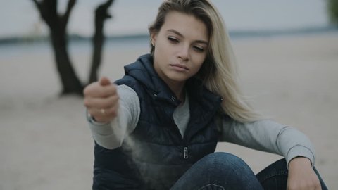 Woman Sprinkles Sand Cloudy Windy Moody Stock Footage Video (100% ...