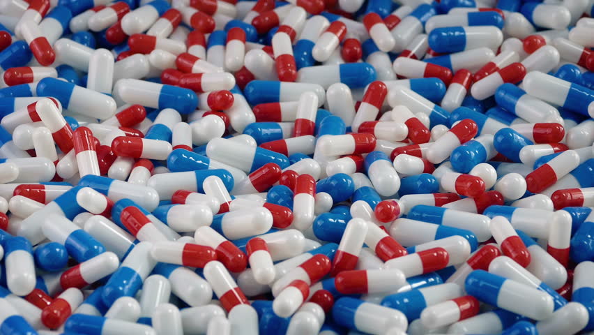 mixed drug capsules - pharmaceutical concept Stock Footage Video (100% ...