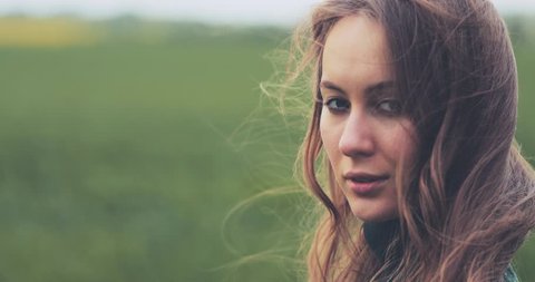 close portrait woman standing on wind Stock Footage Video (100% Royalty ...