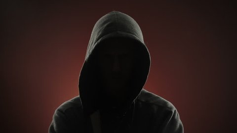 Anonymous Threatening Thug Wearing Hood Stares Stock Footage Video (100 ...
