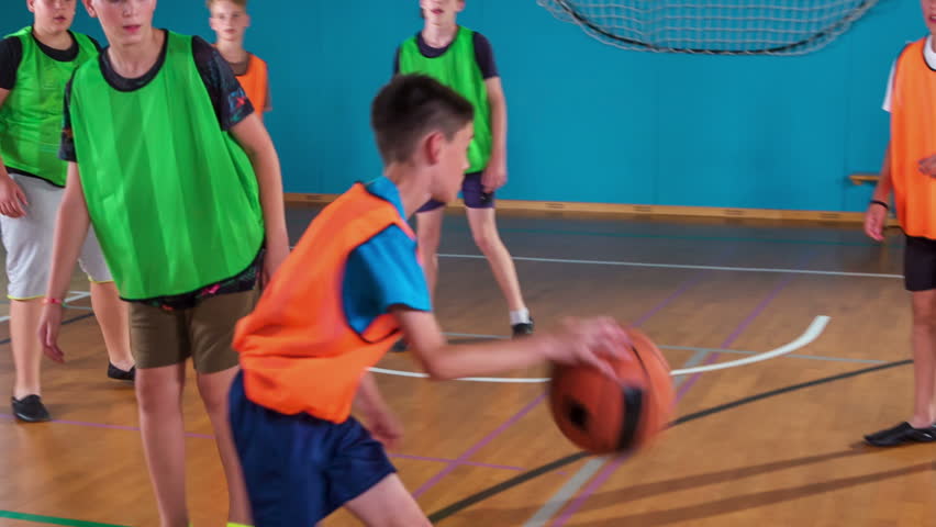 orange team playing against green they're Stock Footage Video (100% ...