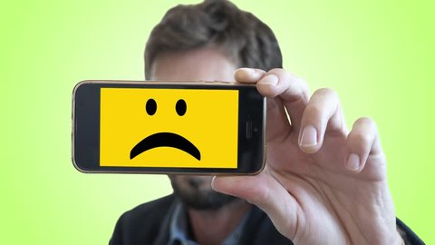 Sad Man Face Smartphone On Green Stock Footage Video (100% Royalty-free ...