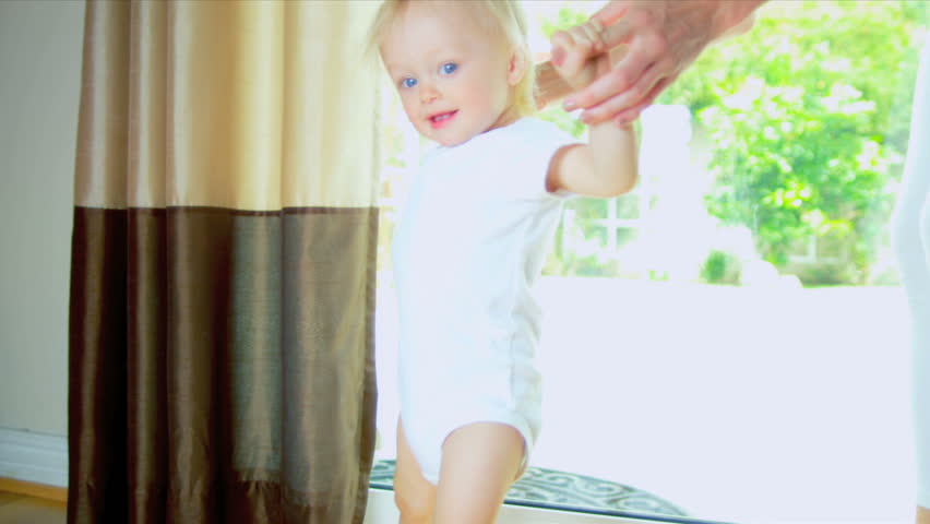 Young Child Taking First Steps Stock Footage Video (100% Royalty-free ...