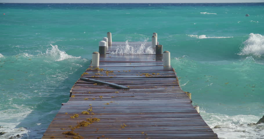 Waves Crashing Against a Dock Stock Footage Video (100% Royalty-free ...
