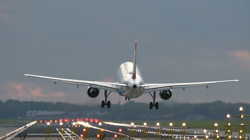 passenger airplane landing towards runway during Stock Footage Video ...