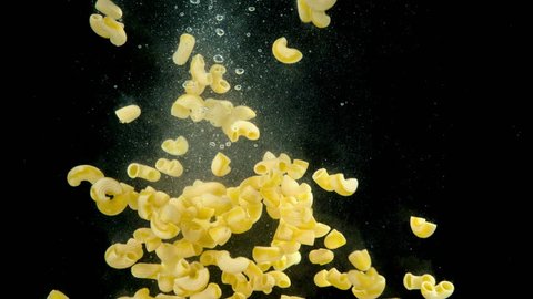 Small Bent Macaroni Slowly Falling Into Stock Footage Video (100% ...