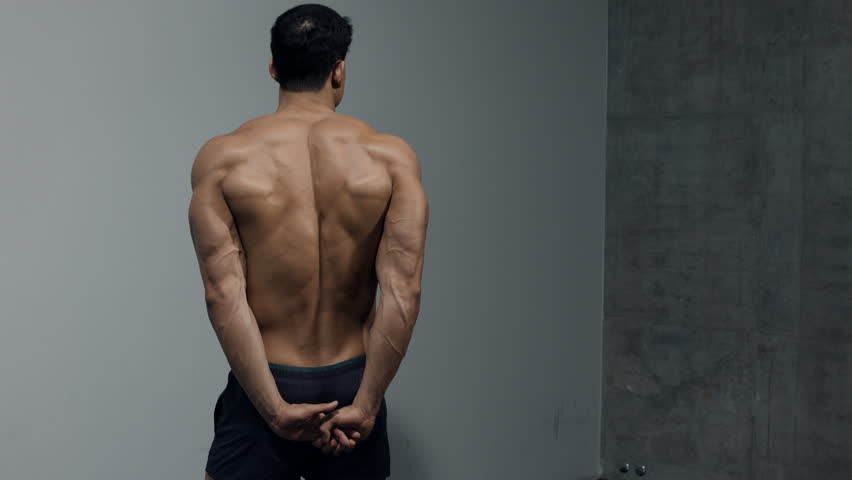 triceps deltoids traps bodybuilder flexing muscles Stock Footage Video ...