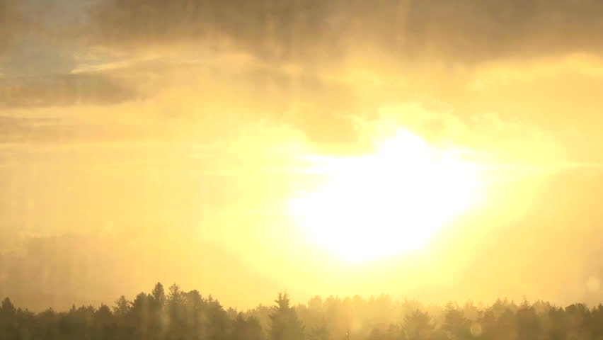 sunlight shining through heavy rain cloud Stock Footage Video (100% ...