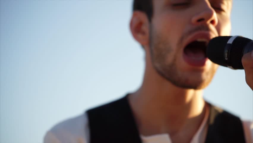 portrait young man who sings song Stock Footage Video (100% Royalty ...