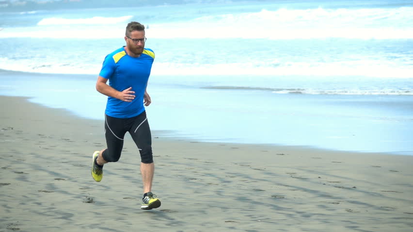 gorgeous woman jogging slow motion front Stock Footage Video (100% ...