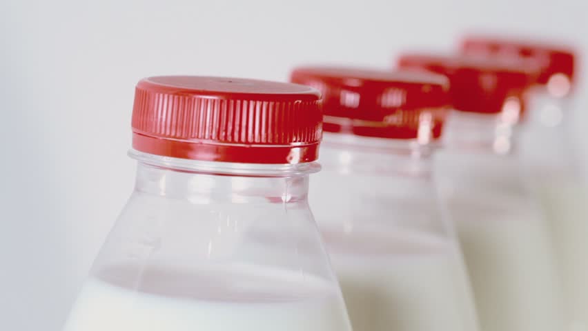 part four bottles milk red cap Stock Footage Video (100% Royalty-free ...