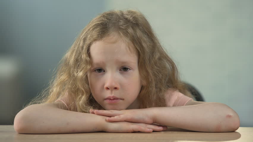 sad little girl sitting table crying Stock Footage Video (100% Royalty ...