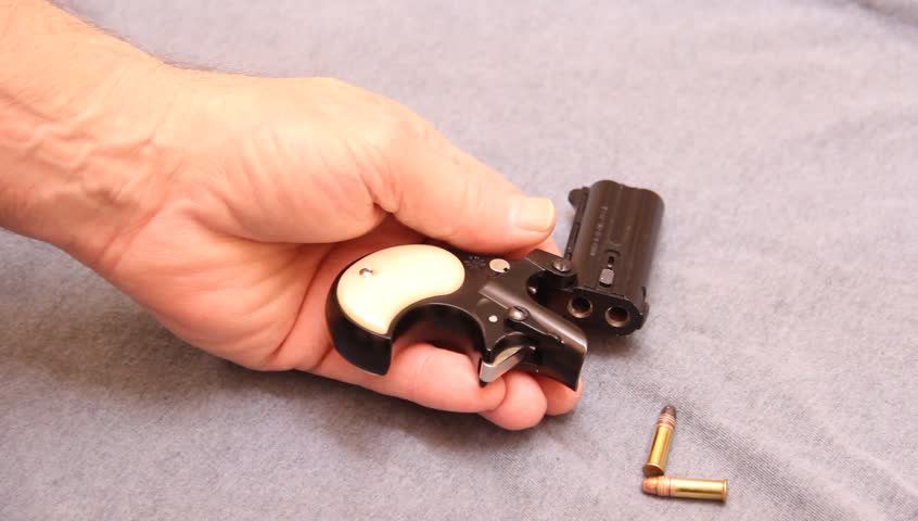 Hand Loading a Small Derringer Stock Footage Video (100% Royalty-free ...