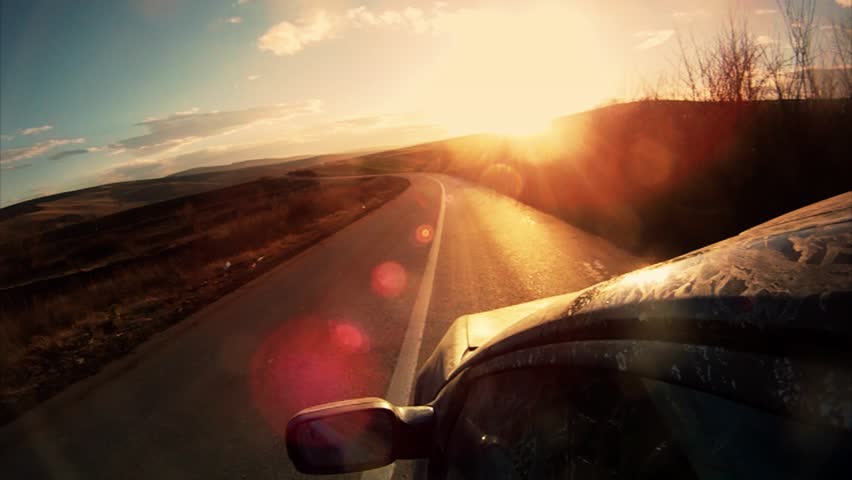 driving towards sunset pov lens flare Stock Footage Video (100% Royalty ...