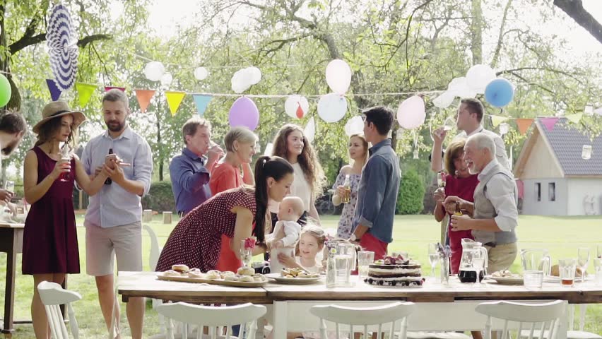 family celebration garden party outside backyard Stock Footage Video ...