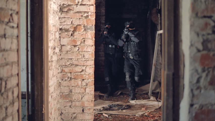 two swat soldiers explore abandoned building Stock Footage Video (100% ...